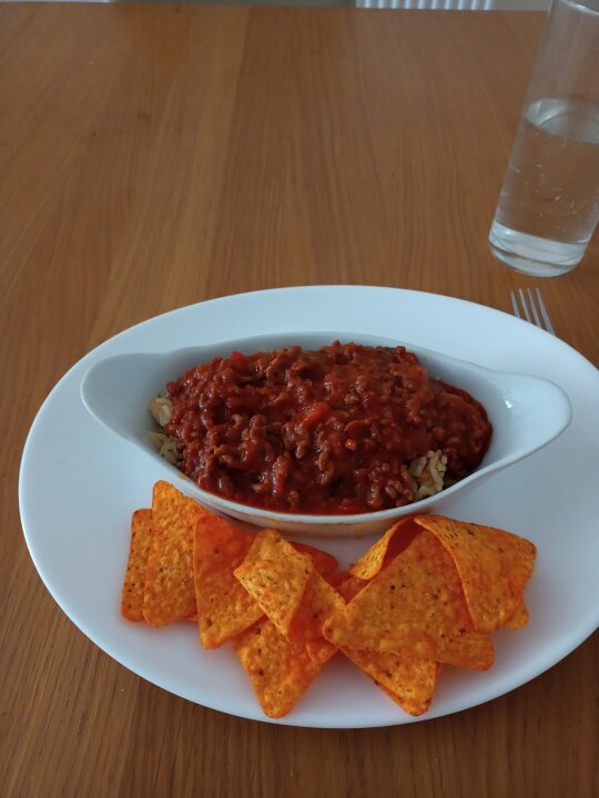 Yummy dinner Chilli , rice and cheese Doritos ( I didn't have any ...