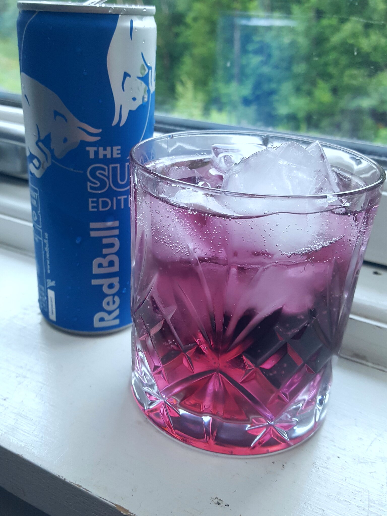 Wow, what a brilliant color red bull's new flavour is! It looks so ...