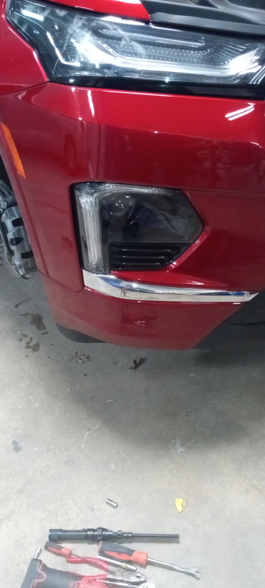 2,123$ for a plastic fog light 2,245 installed | Cars