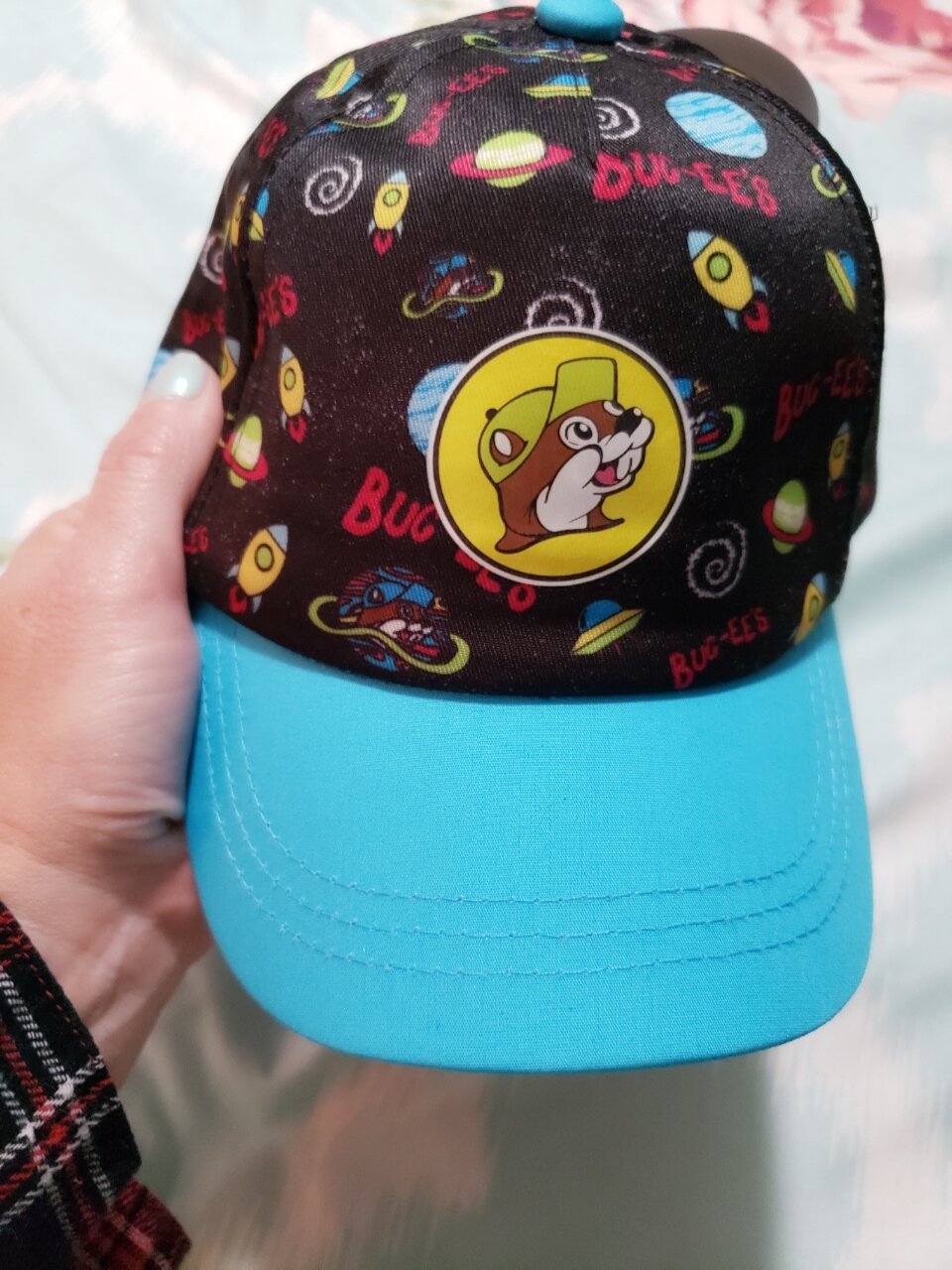 I brought him home a hat from Buc-ees, so cute. | Family