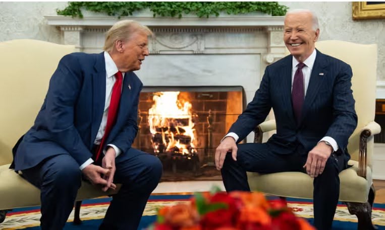 Caption. What is the man on the left saying to the man on the right ...